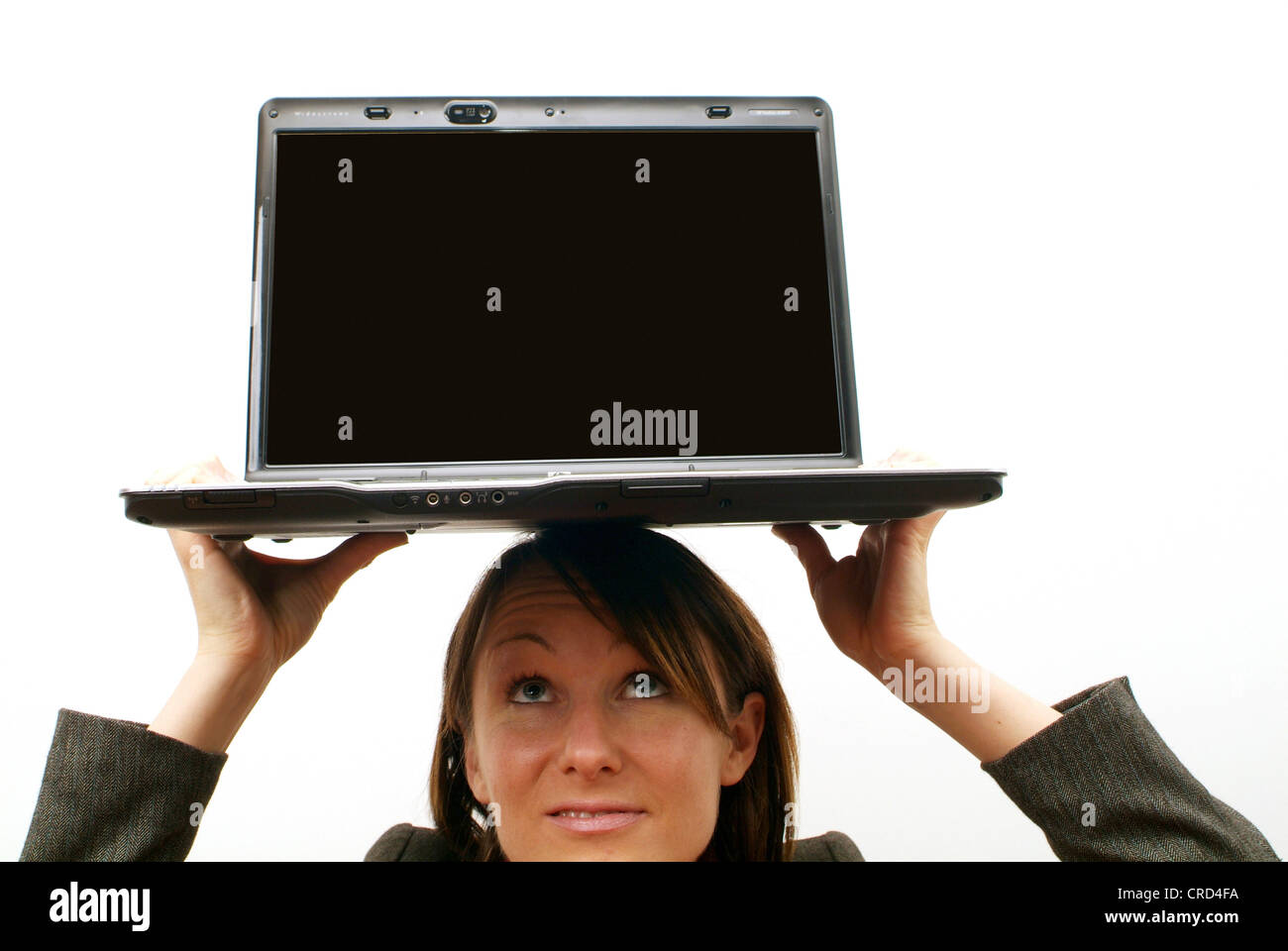 young businesswoman with laptop on head Stock Photo - Alamy