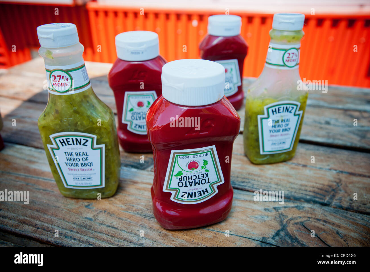 Heinz Tomato Ketchup and relish on the condiment table of an outdoor ...