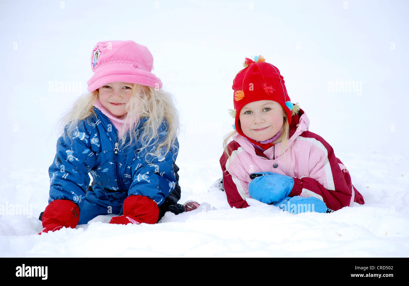 girls playing in snow Stock Photo - Alamy