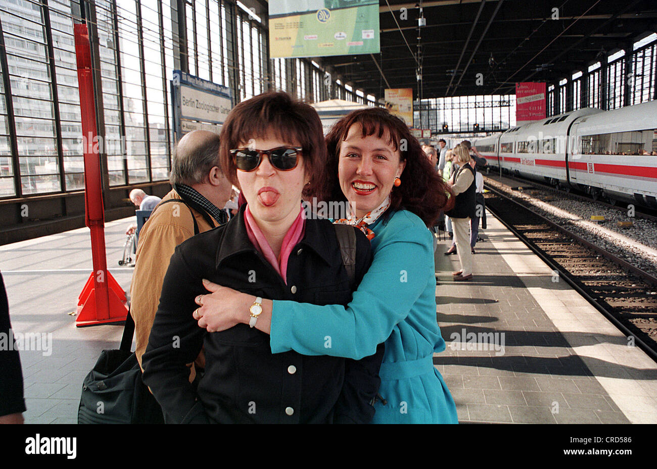Berlin Zoo Station, travelers on the platform Stock Photo - Alamy