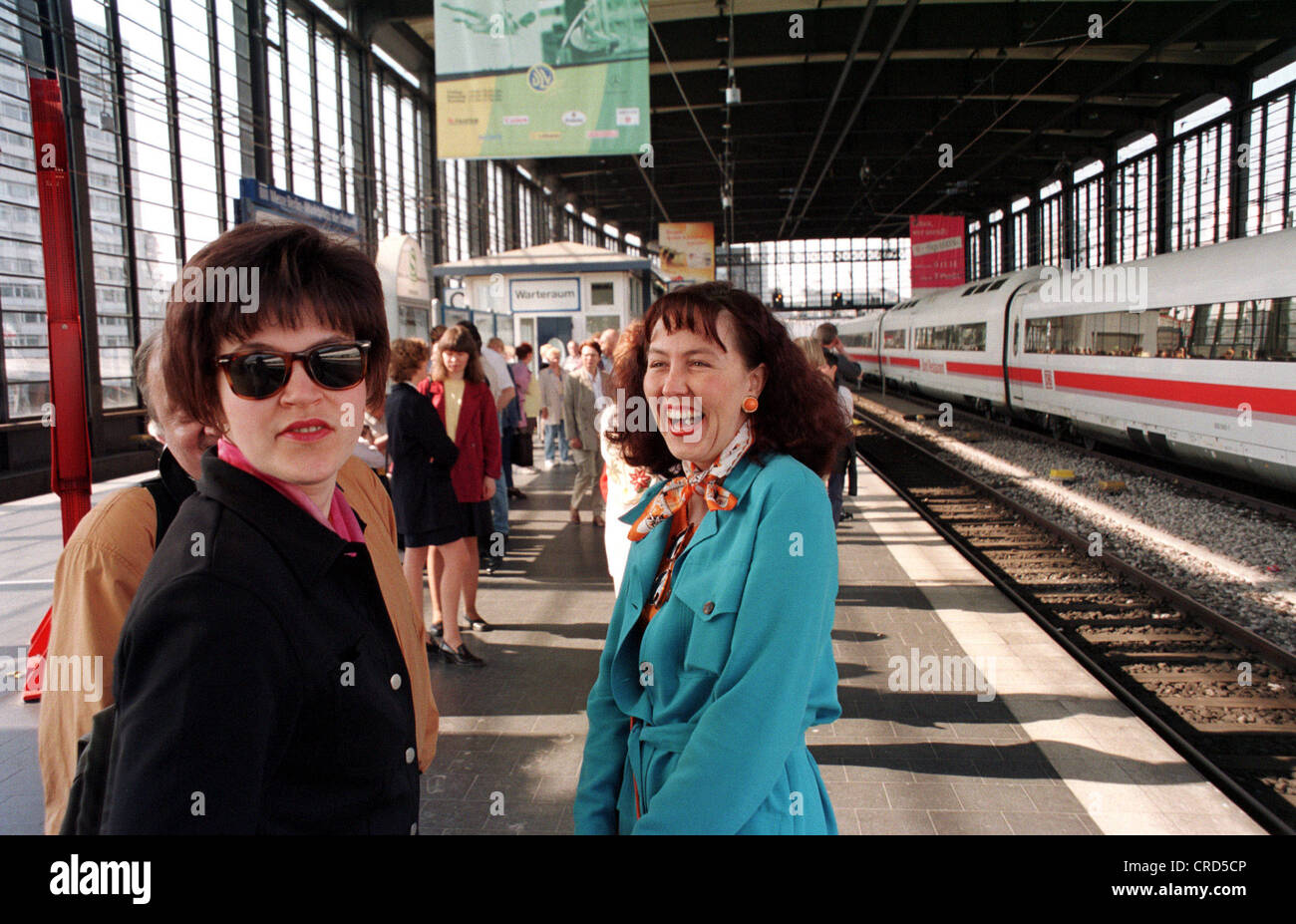 Berlin Zoo Station, travelers on the platform Stock Photo - Alamy