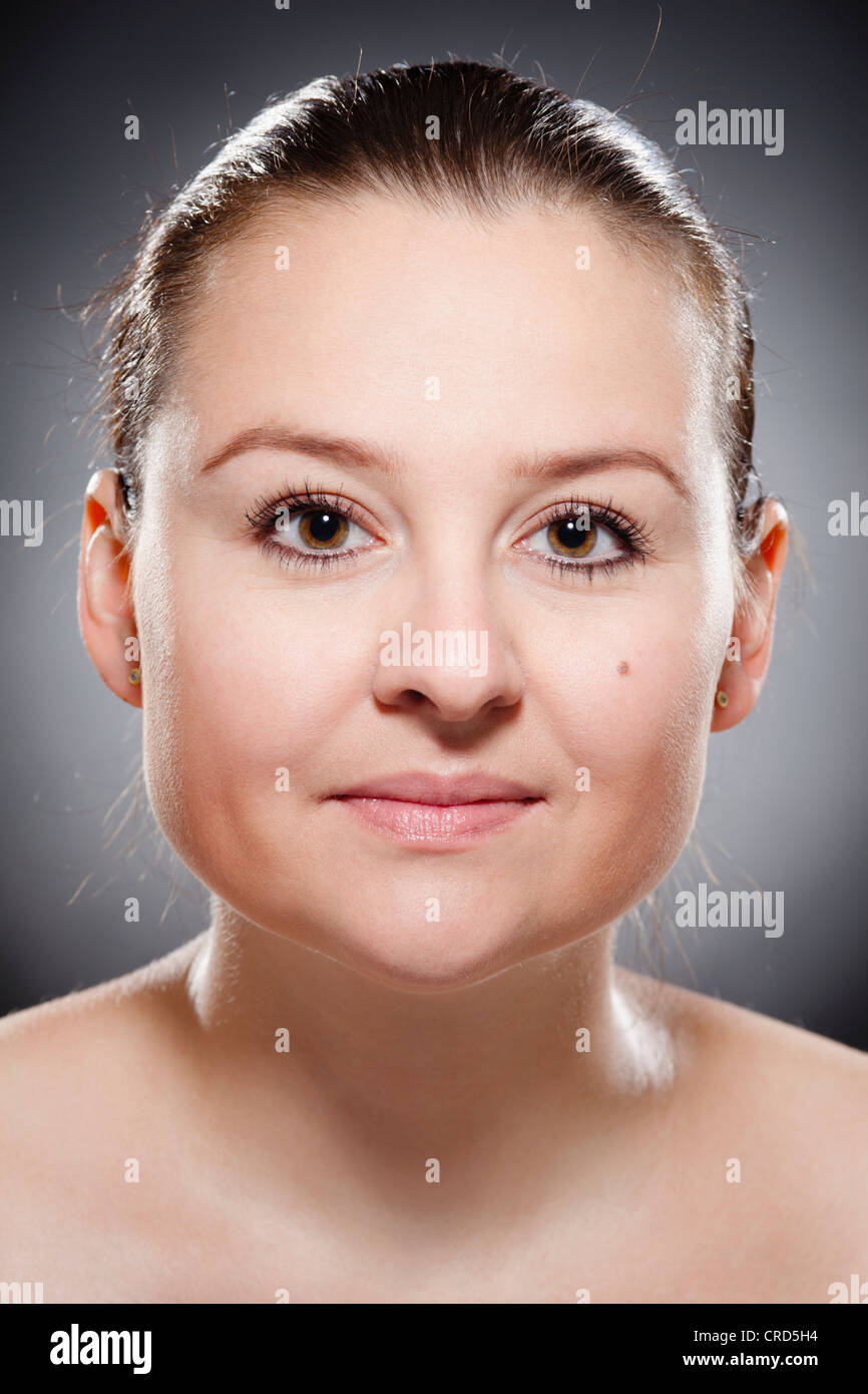 Young woman with a neutral facial expression Stock Photo - Alamy Young woman with a neutral facial expression Stock Photo - Alamy