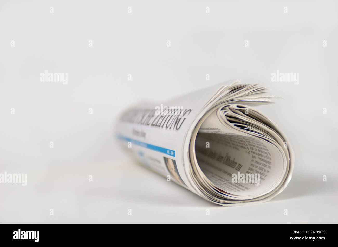 Rolled newspapers hi-res stock photography and images - Alamy