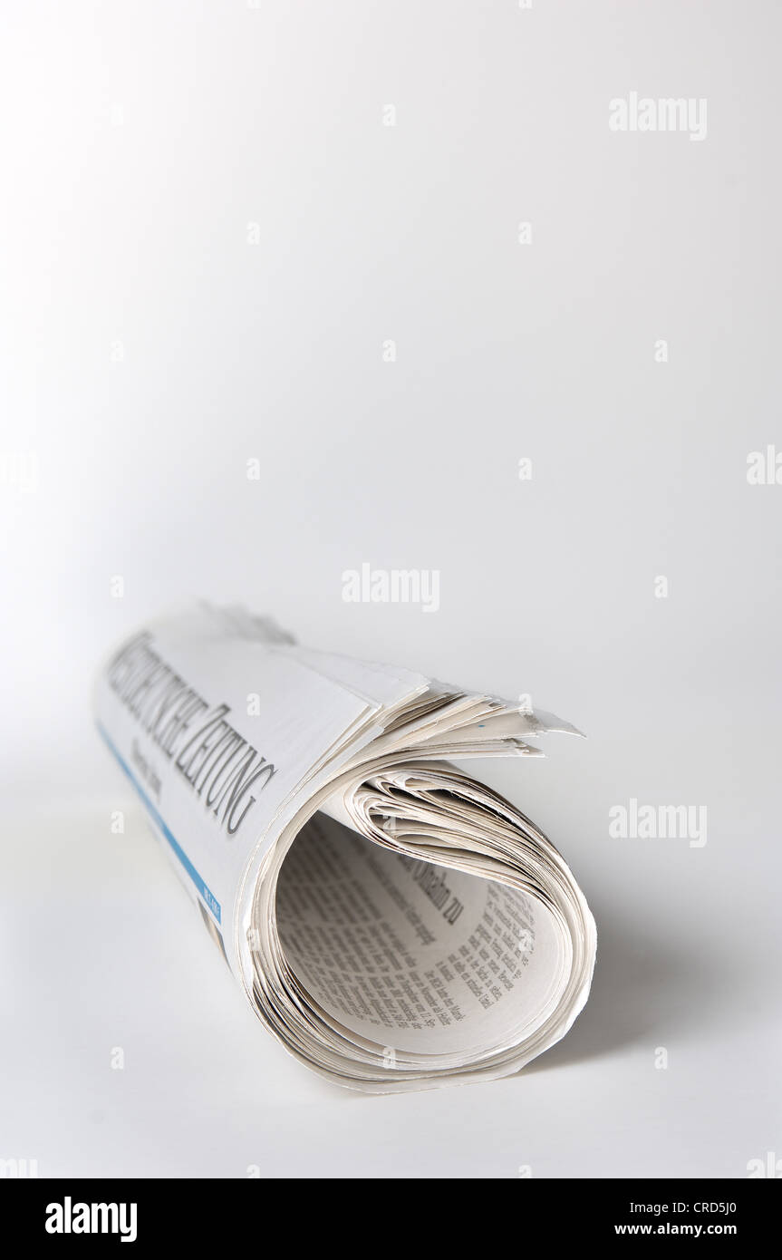 Rolled newspaper hi-res stock photography and images - Alamy