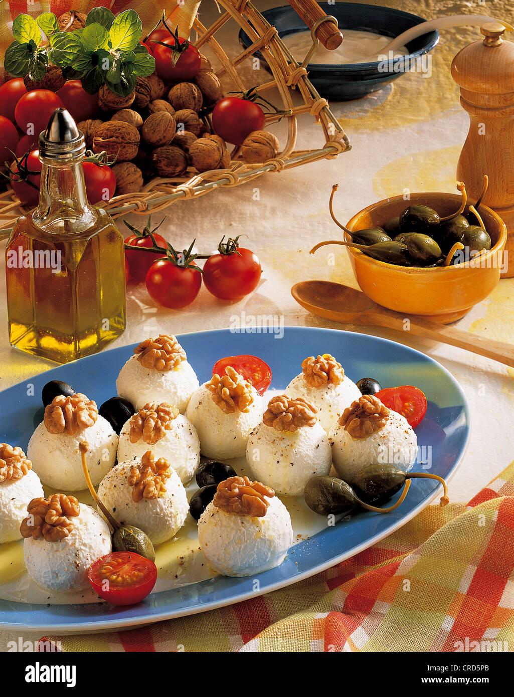 Yogurt balls with capers and walnuts hi-res stock photography and ...