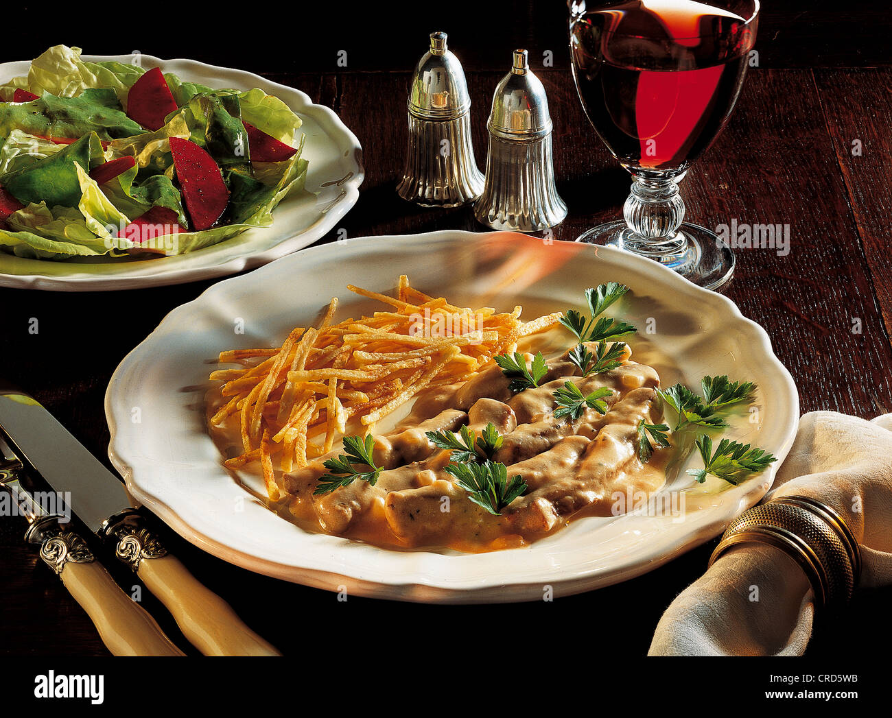 Fillet meat strips with straw potatoes hi-res stock photography and ...