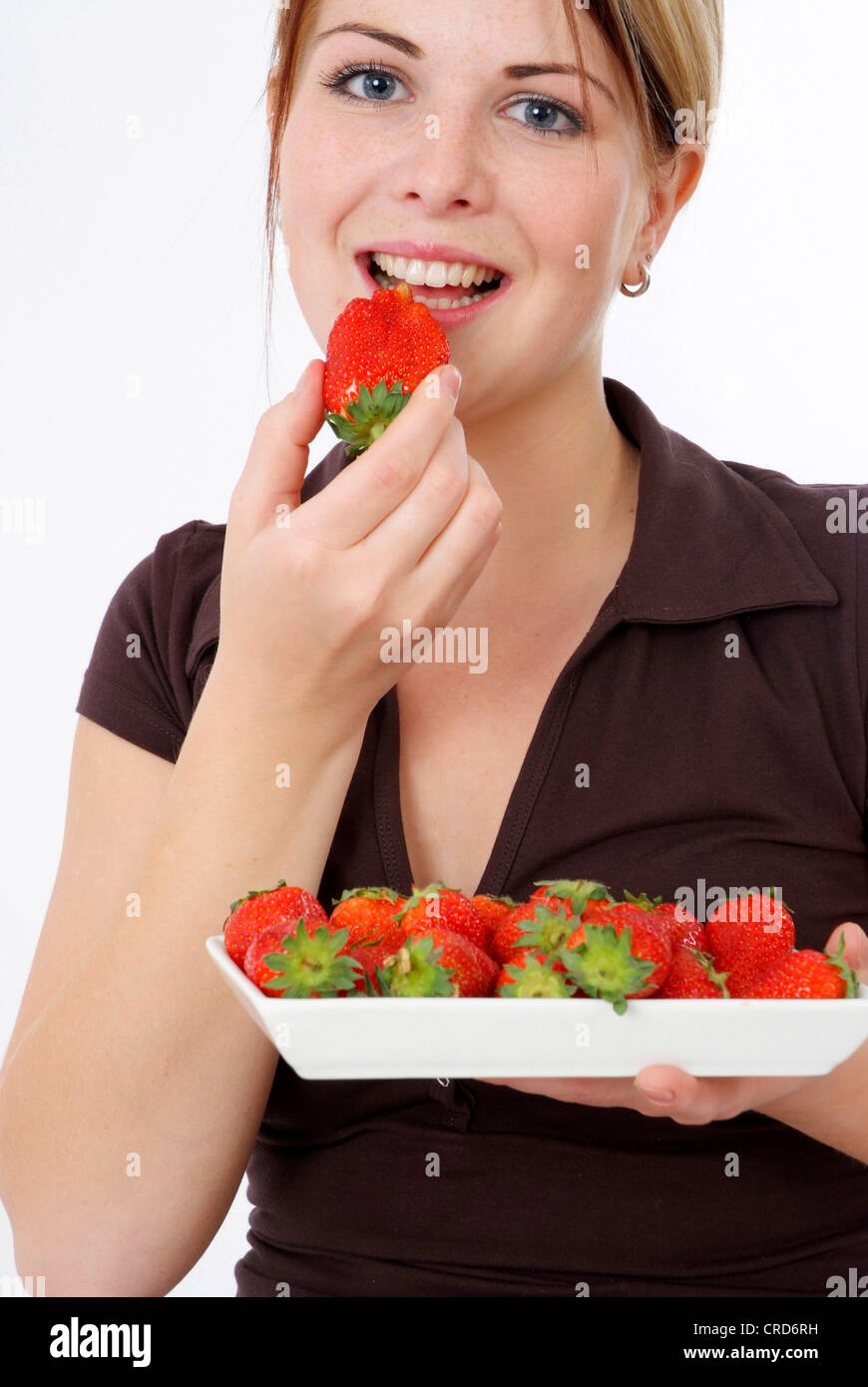 Woman eating berries cut out hi-res stock photography and images - Alamy
