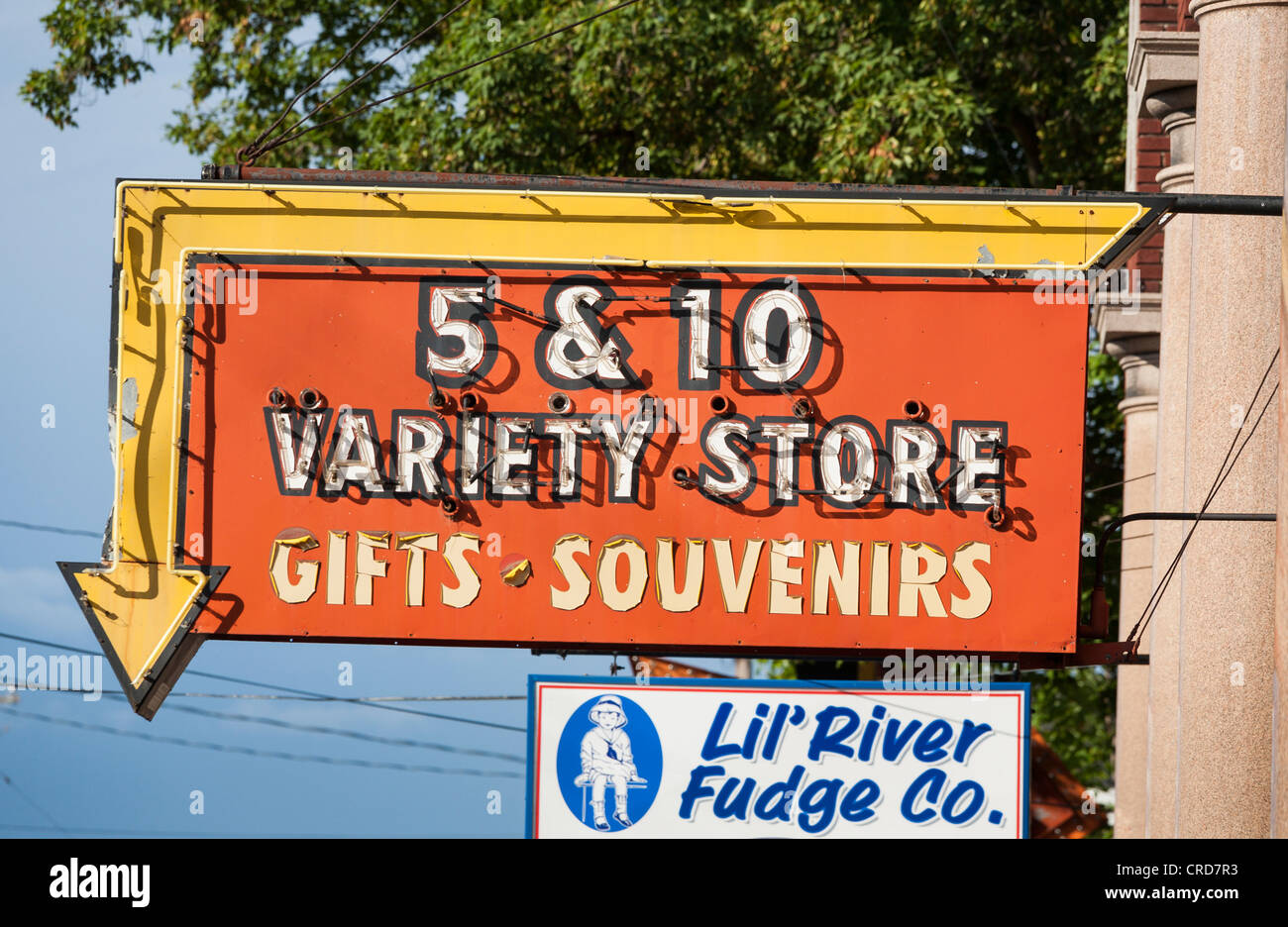 Worn 5 &10 Variety Store sign. A slightly peeling orange sign for an ...