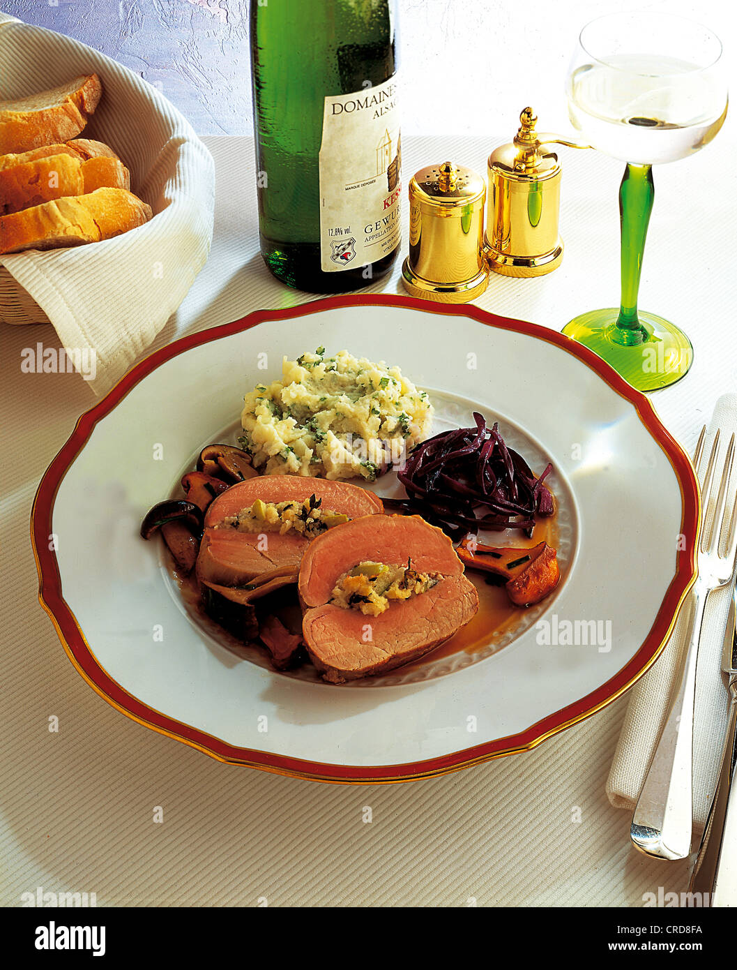 Provencal roast pork with a herb-Roquefort stuffing, France Stock Photo ...