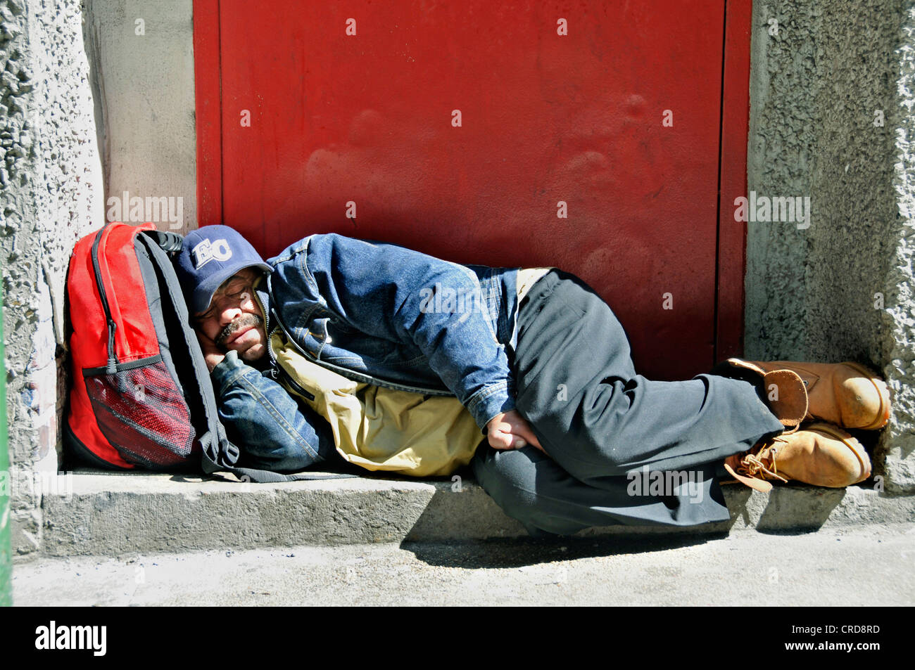 a homeless person sleeps on a stair, USA, New York City, Manhattan ...