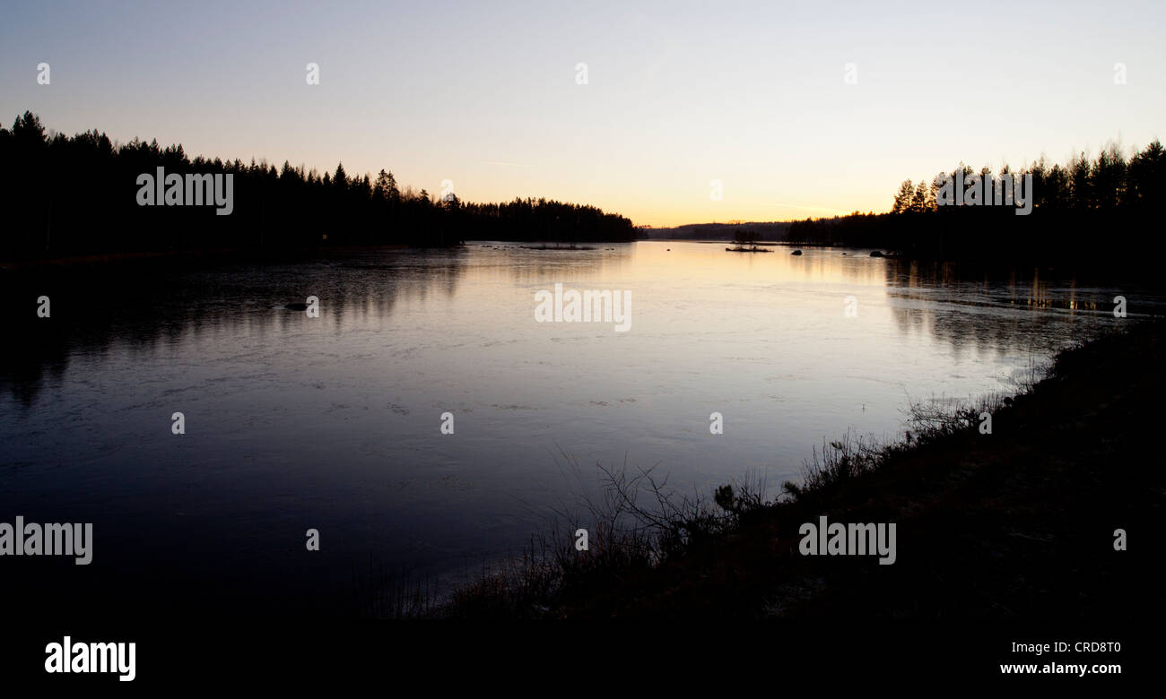 First ice skim layer on lake surface at Autumn , Finland Stock Photo ...