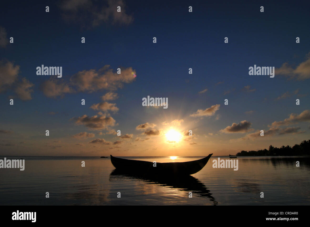 Traditional Malagasy boat near the beach at sunset, Madagascar, Africa ...