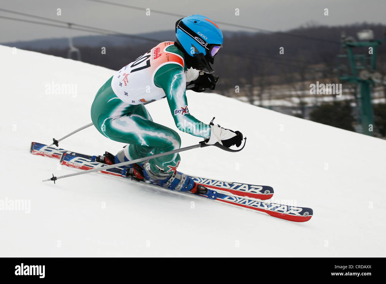 A downhill snow skier in a race Stock Photo - Alamy