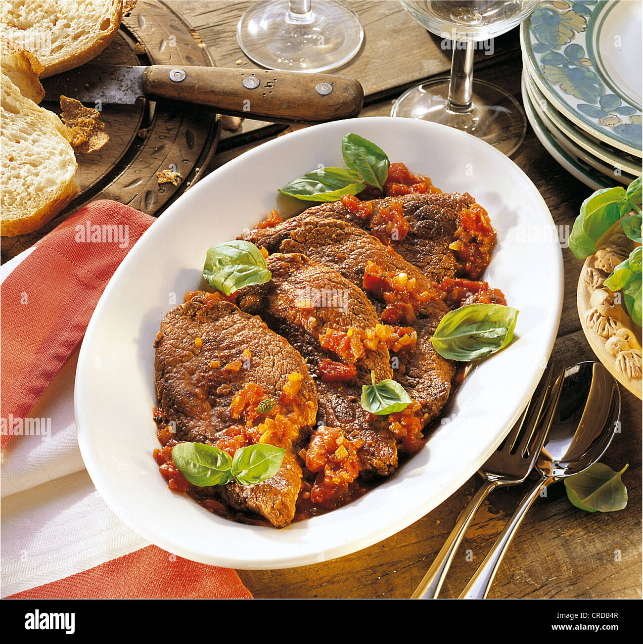 Beef steaks alla pizzaiola, Italy Stock Photo - Alamy