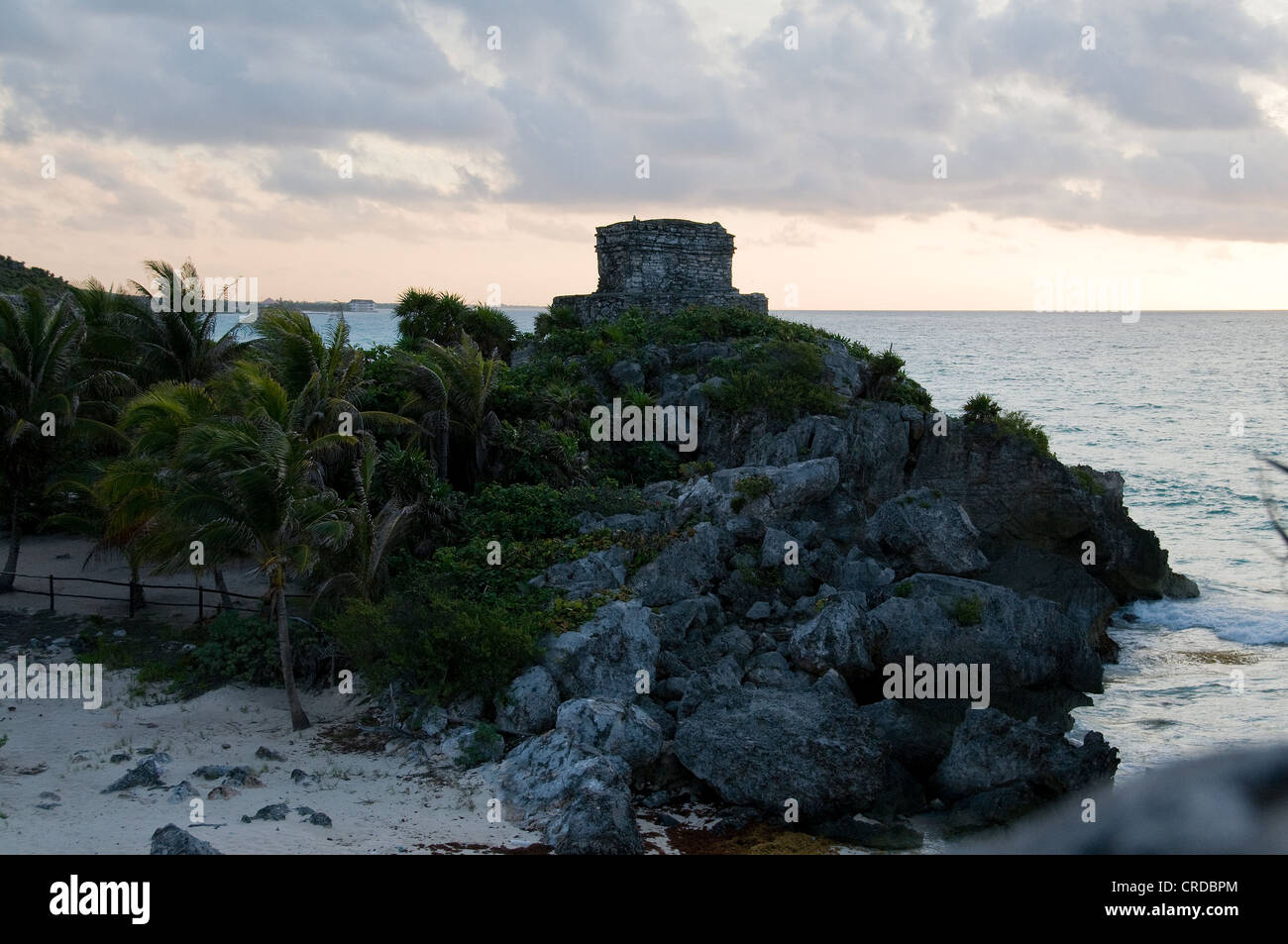 Tulum's Temple of the Wind which sits on a cliff overlooking the ...