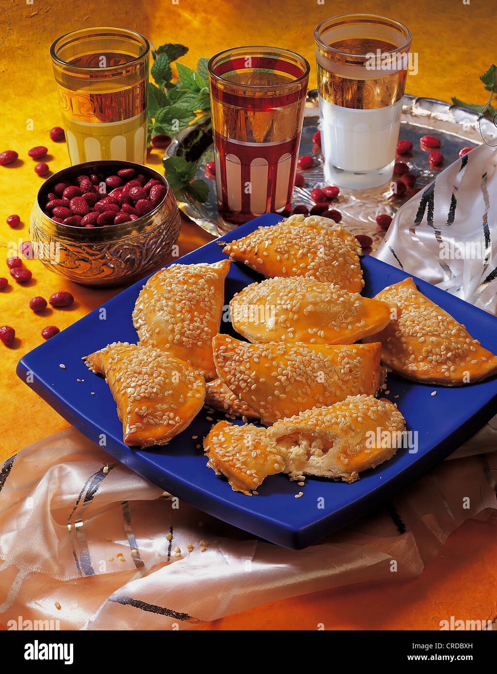 Stuffed sesame pastry moons, Israel Stock Photo - Alamy