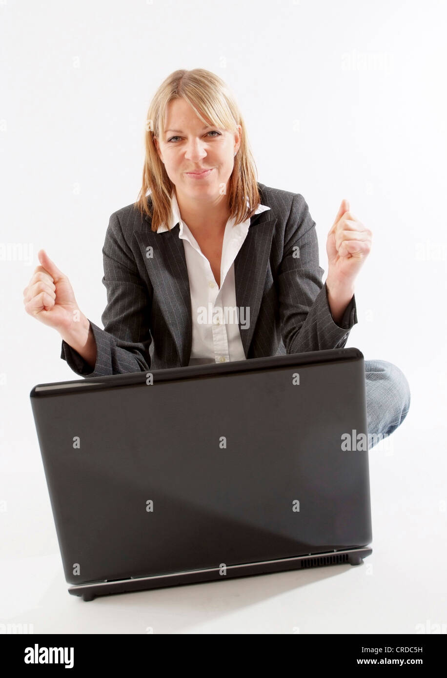 successful woman using laptop Stock Photo - Alamy