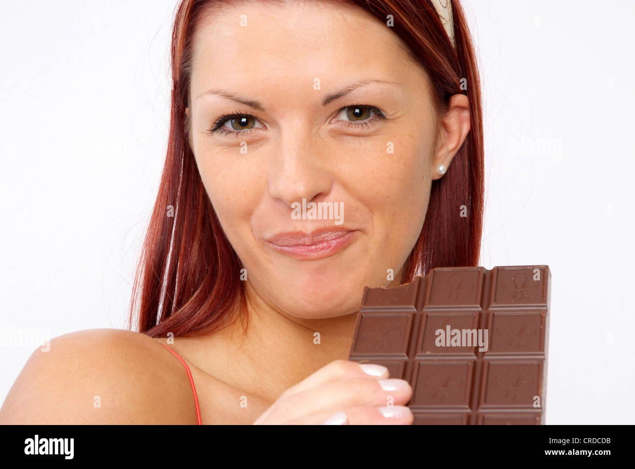 young woman with chocolate bar Stock Photo - Alamy