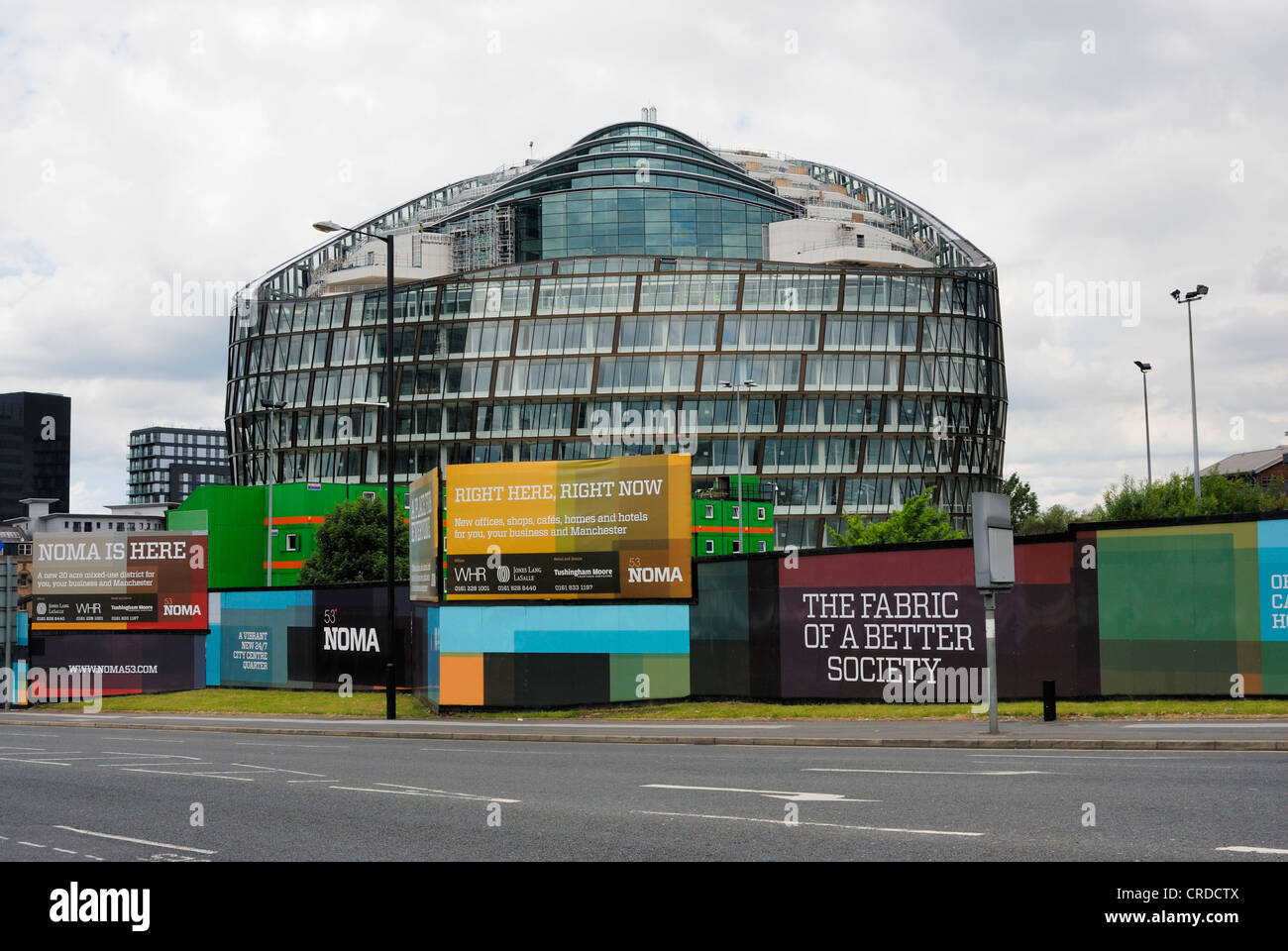 The NOMA building is a glass futuristic mixed use building currently ...