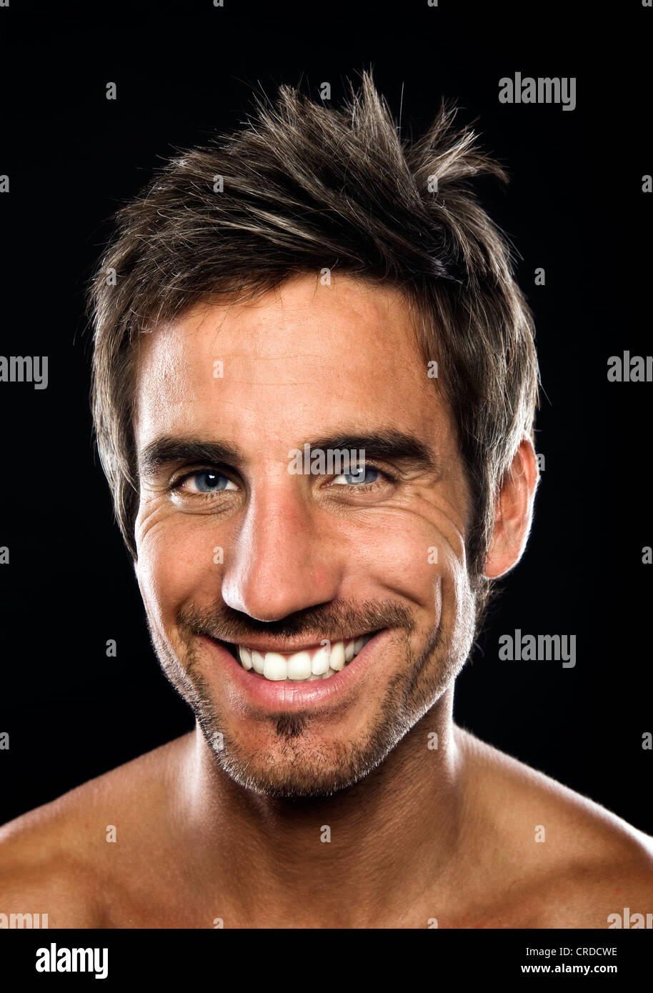 Young man smiling, portrait Stock Photo - Alamy