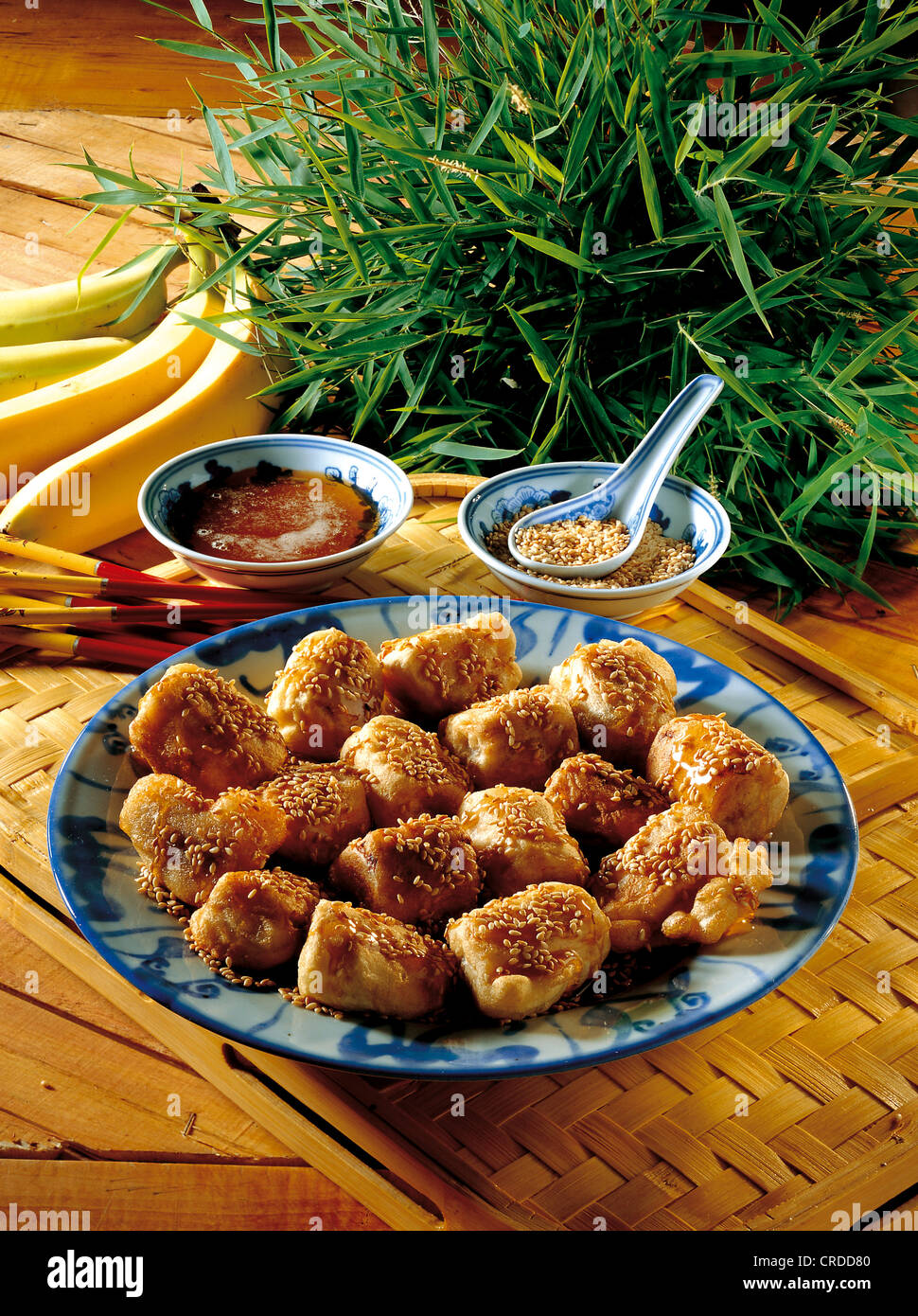 Honey bananas with sesame seeds, China Stock Photo - Alamy