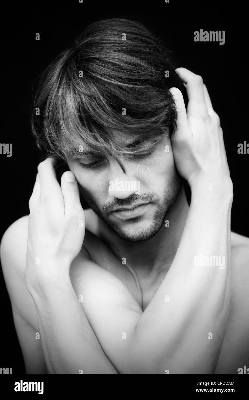 Caucasian head on hands Black and White Stock Photos & Images - Alamy