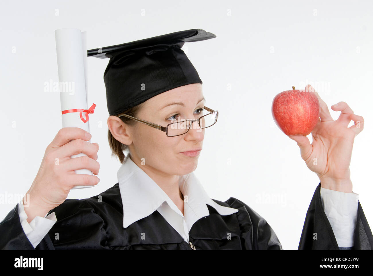 Woman Graduate Apple High Resolution Stock Photography and Images - Alamy