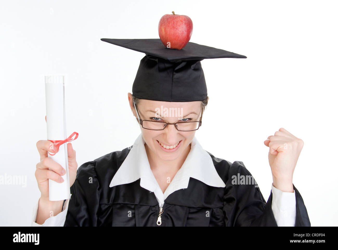 symbolic for brainfood, degree holder with apple Stock Photo - Alamy