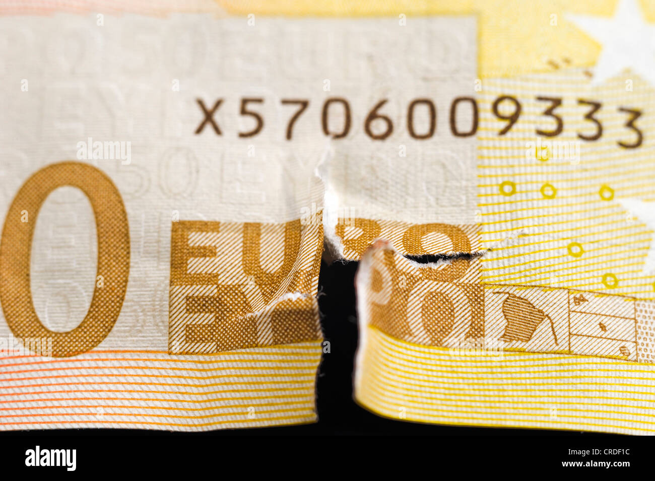 Torn 50 euro banknote Stock Photo - Alamy