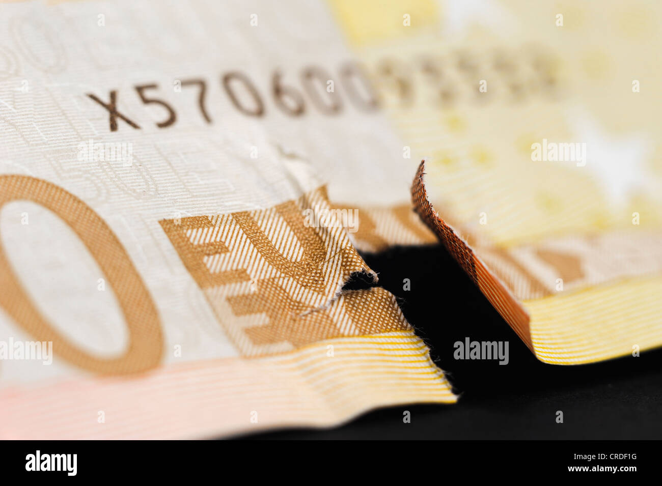 Torn 50 euro banknote Stock Photo - Alamy