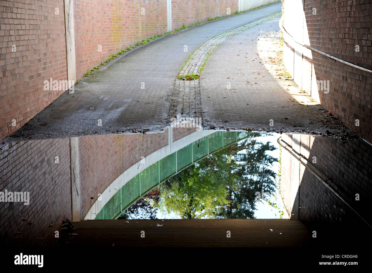Flooding in an underpath with reflections Stock Photo - Alamy