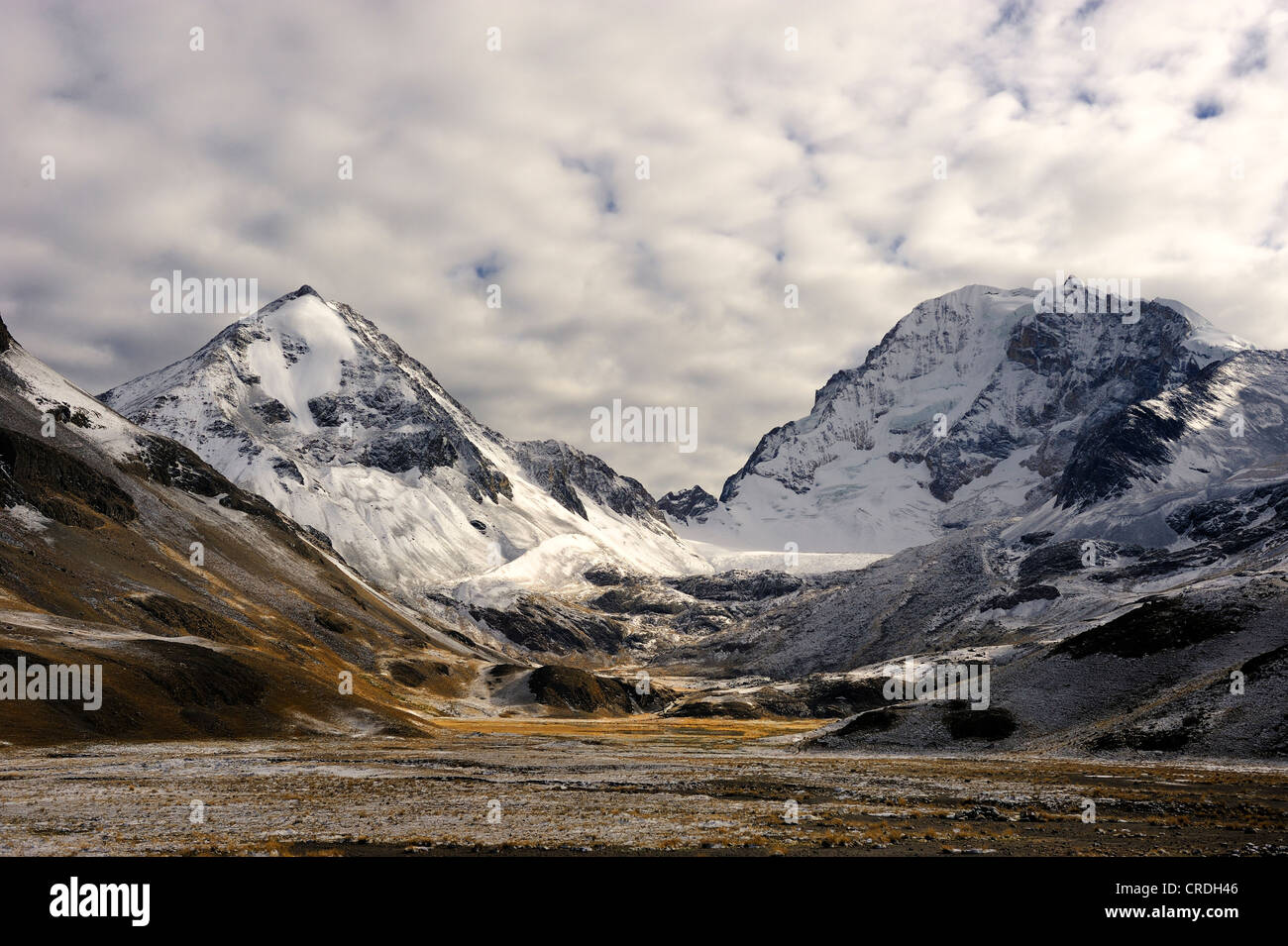 Snow-covered Andes Mountains with a high plateau at sunrise, La Paz ...