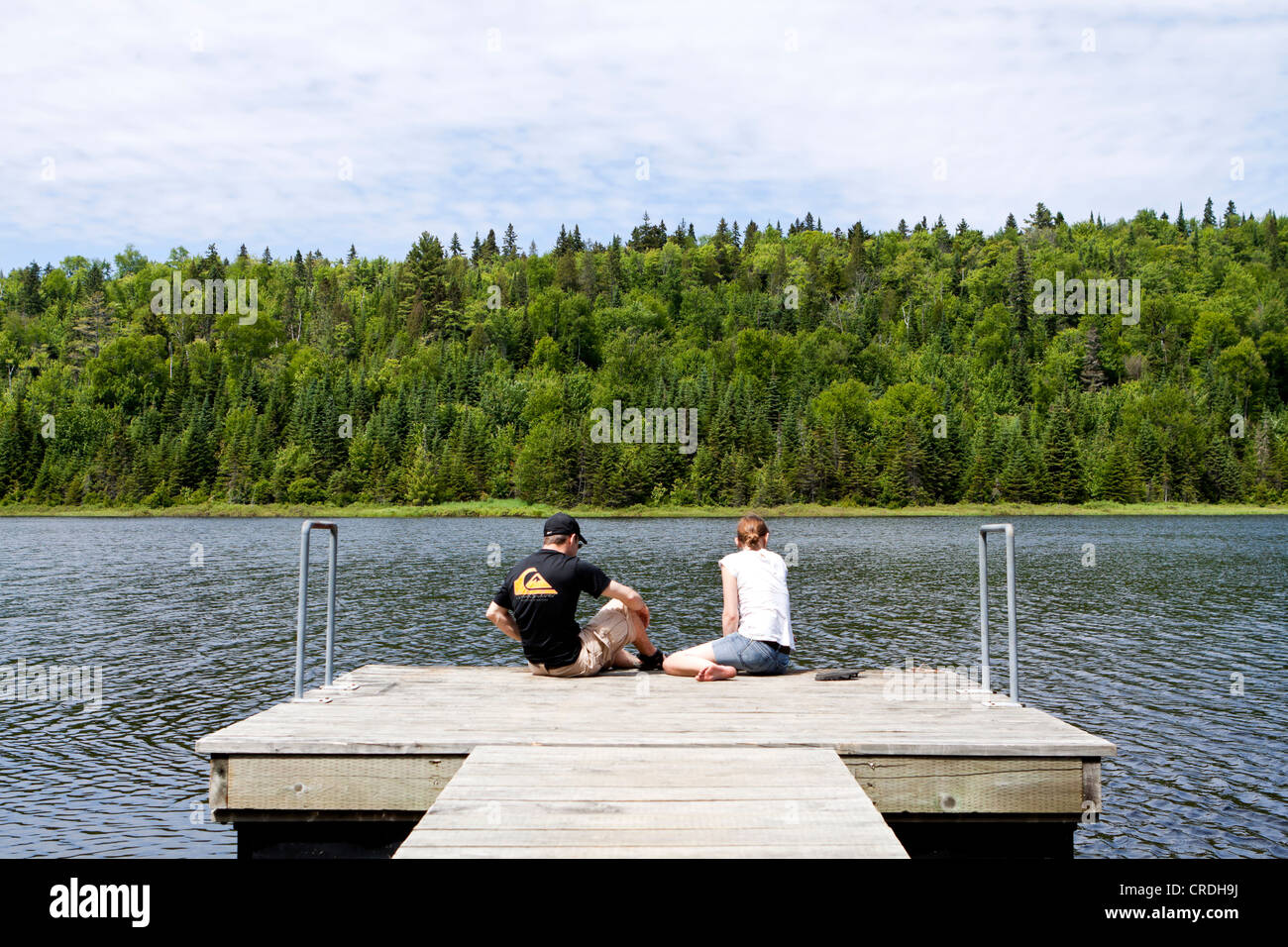 Lovers on deck on the lake Stock Photo - Alamy