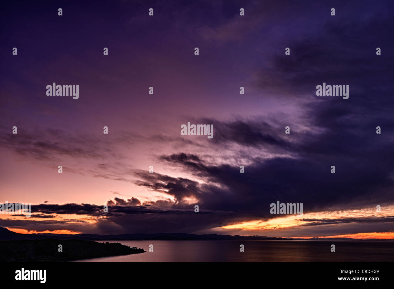 Thundercloud over Lake Titicaca in the blue hour, Copacabana, Bolivia ...