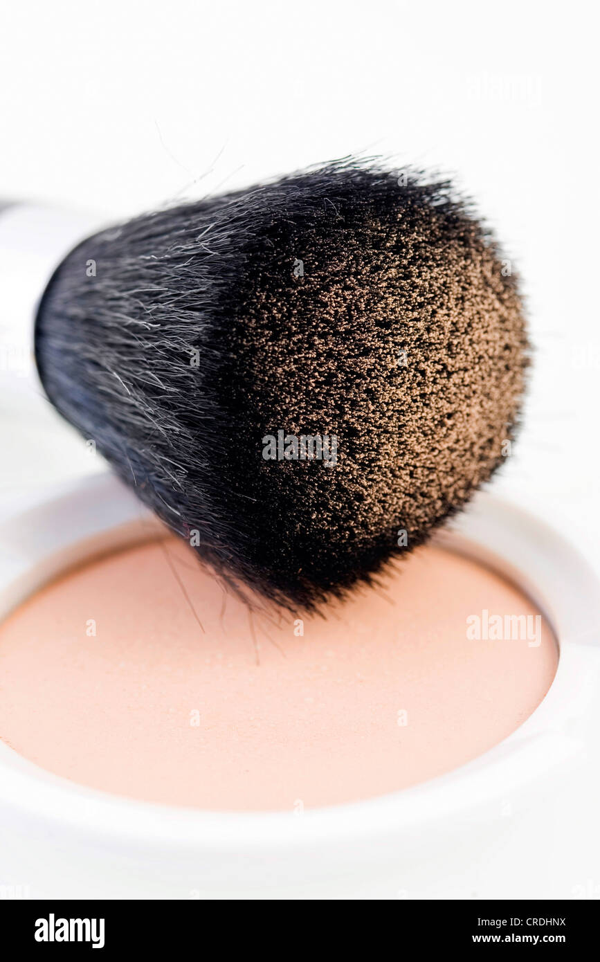 cosmetic brush with powder Stock Photo - Alamy