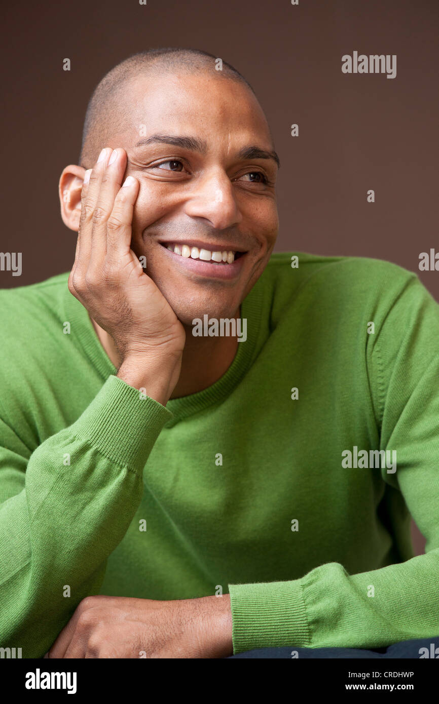 Dark skinned man smiling hi-res stock photography and images - Alamy