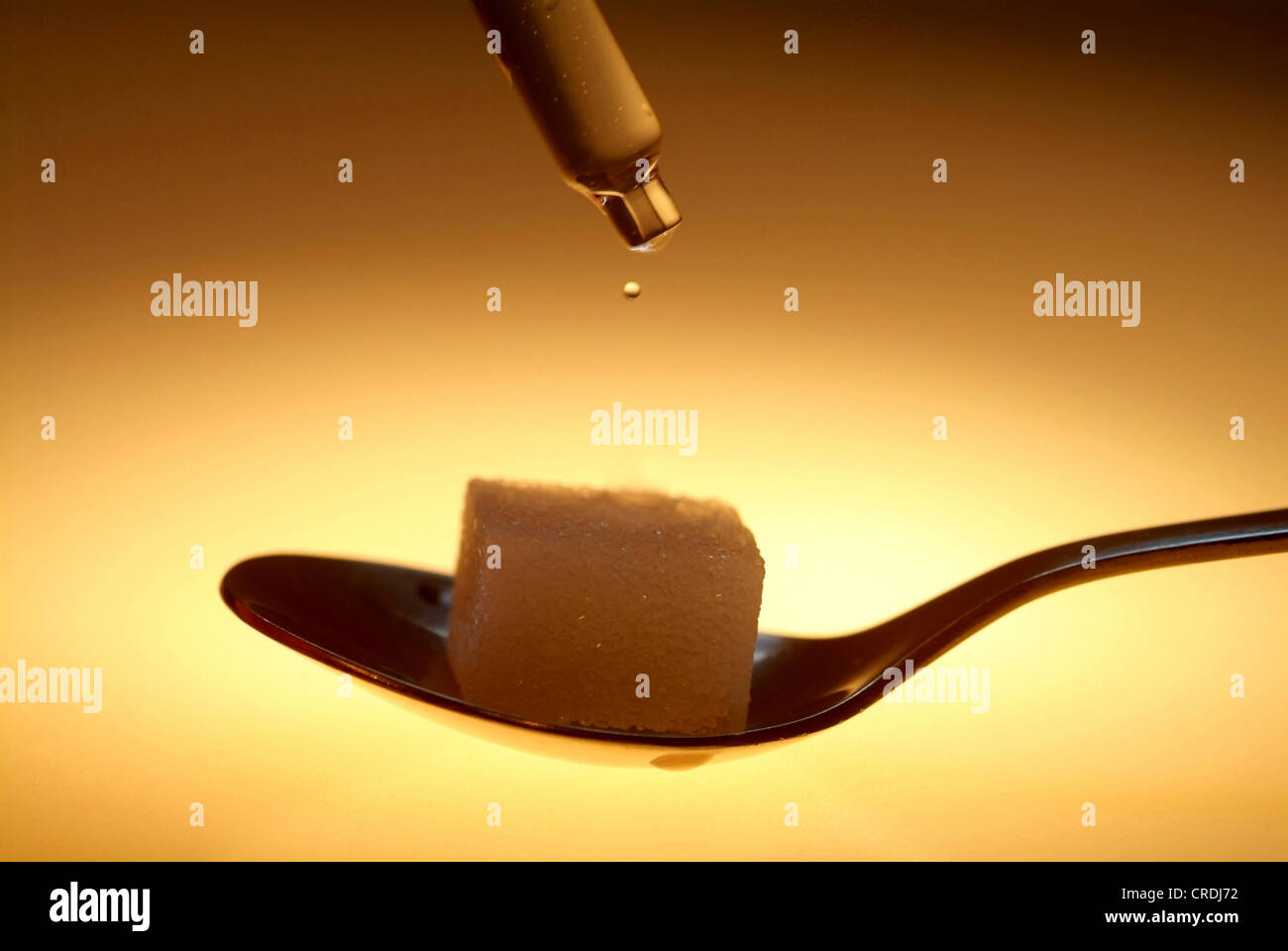 lump sugar and medicine Stock Photo - Alamy