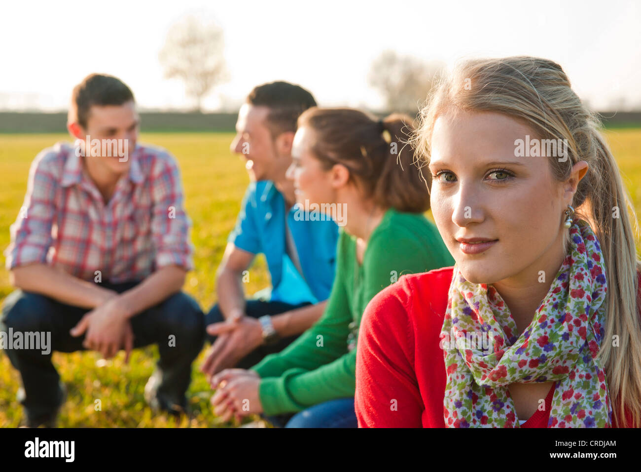Young people on a walk in natural surroundings Stock Photo - Alamy