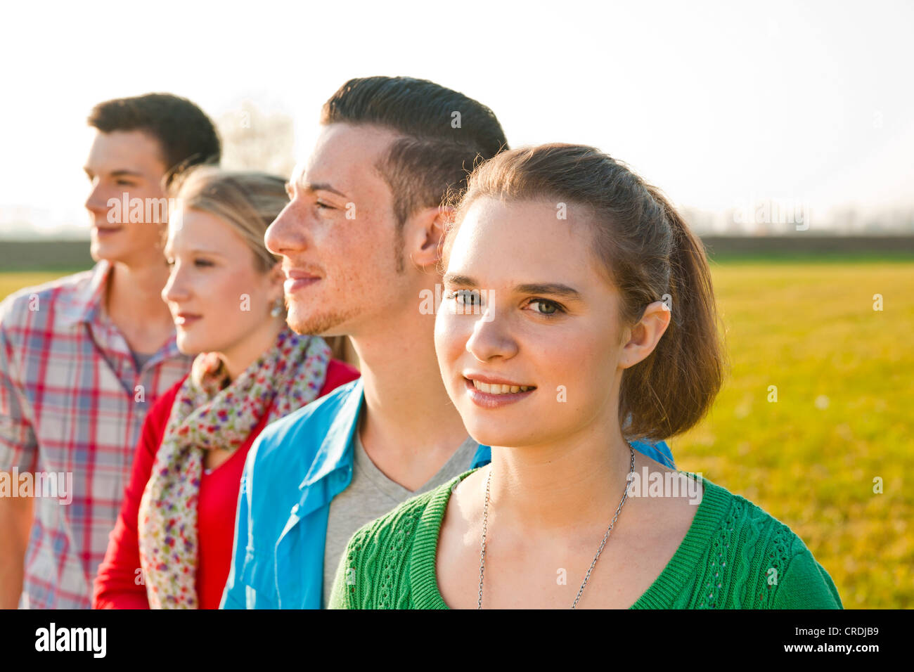 Young people on a walk in natural surroundings Stock Photo - Alamy
