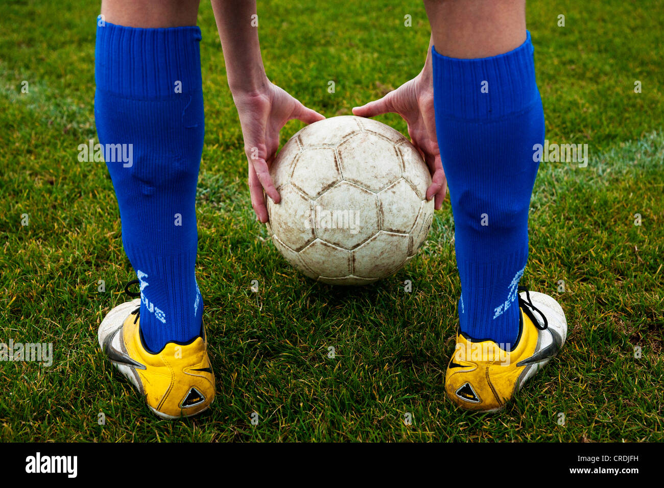 Soccer player positioning ball, soccer training Stock Photo - Alamy