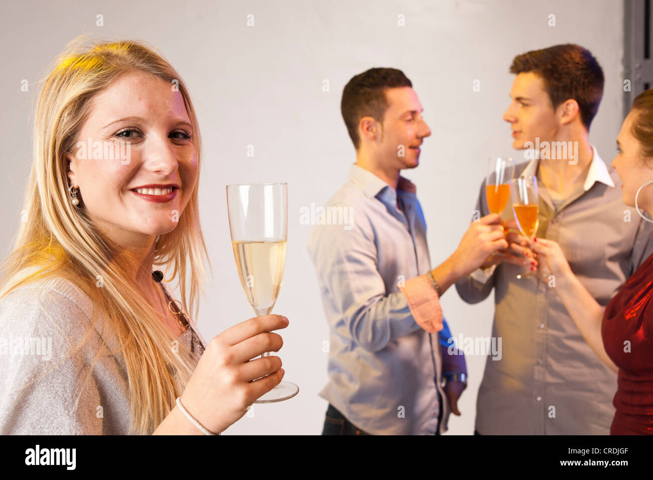 Group of young people partying Stock Photo - Alamy