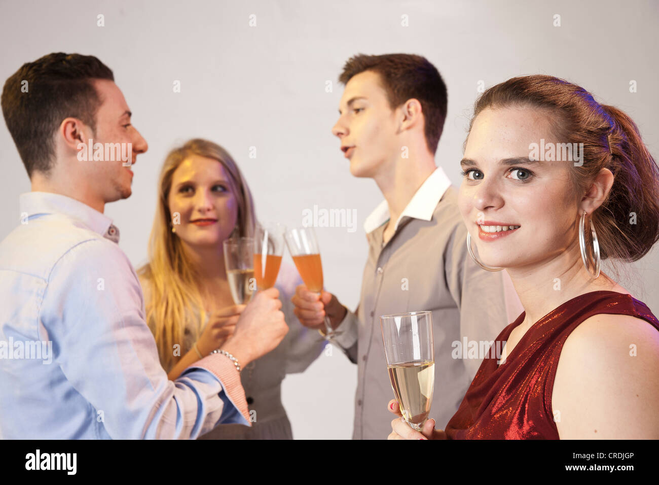 Group of young people partying Stock Photo - Alamy