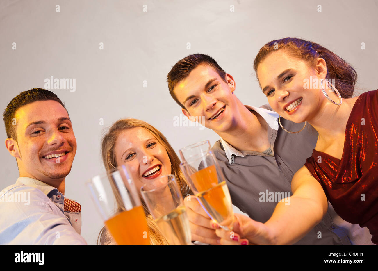 Group of young people partying Stock Photo - Alamy