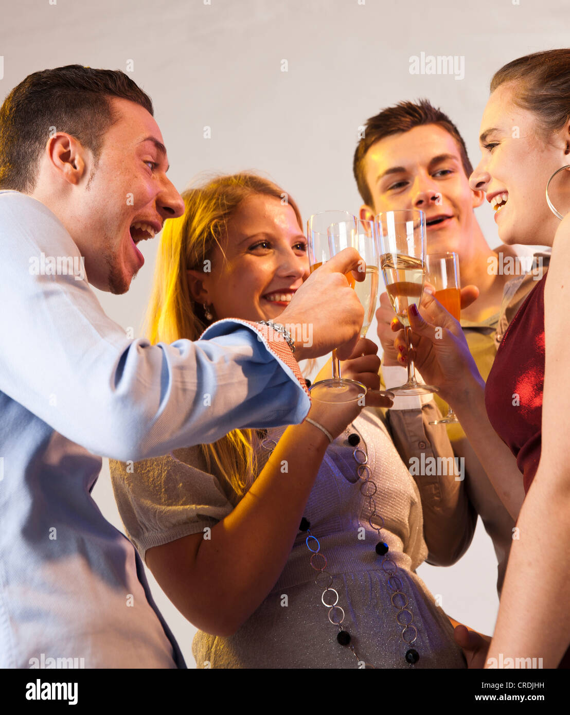 Group of young people partying Stock Photo - Alamy