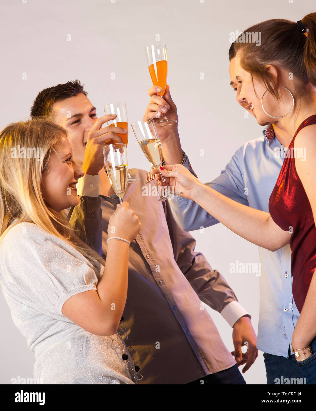 Group of young people partying Stock Photo - Alamy