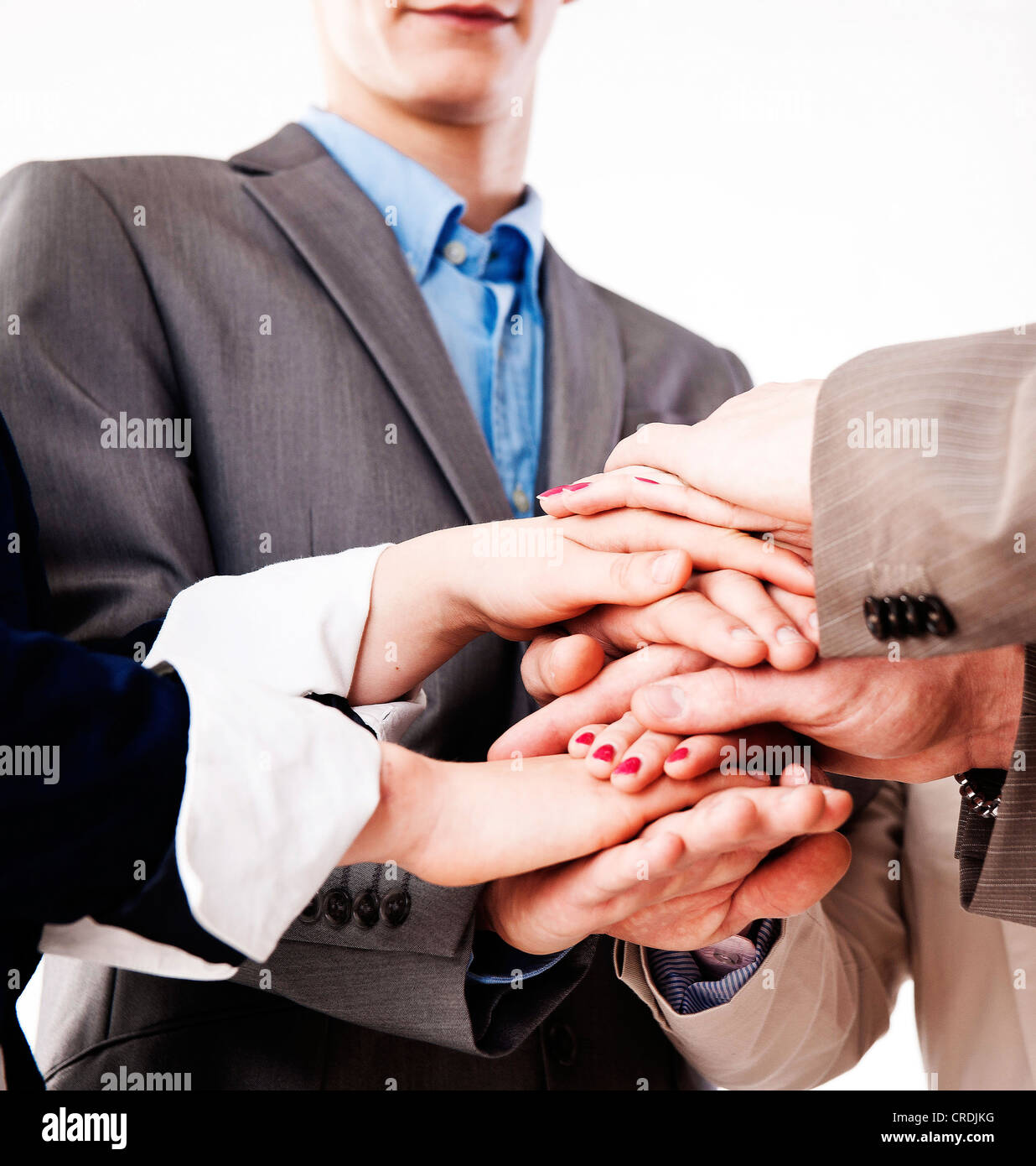 Business people, hand on hand Stock Photo - Alamy