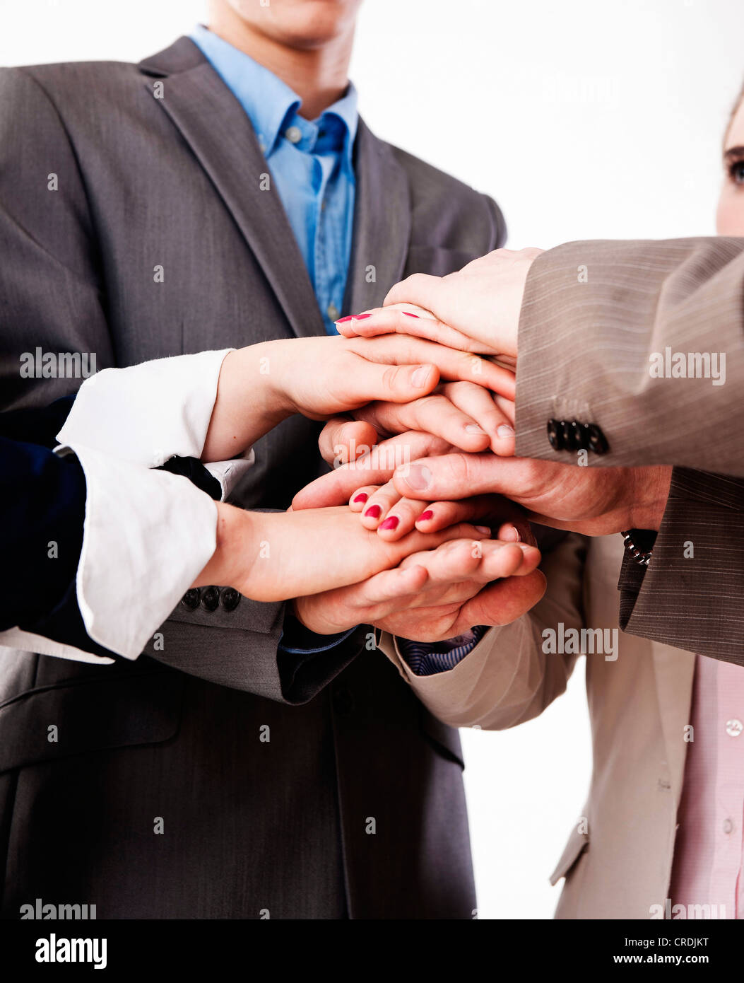 Business people, hand on hand Stock Photo - Alamy
