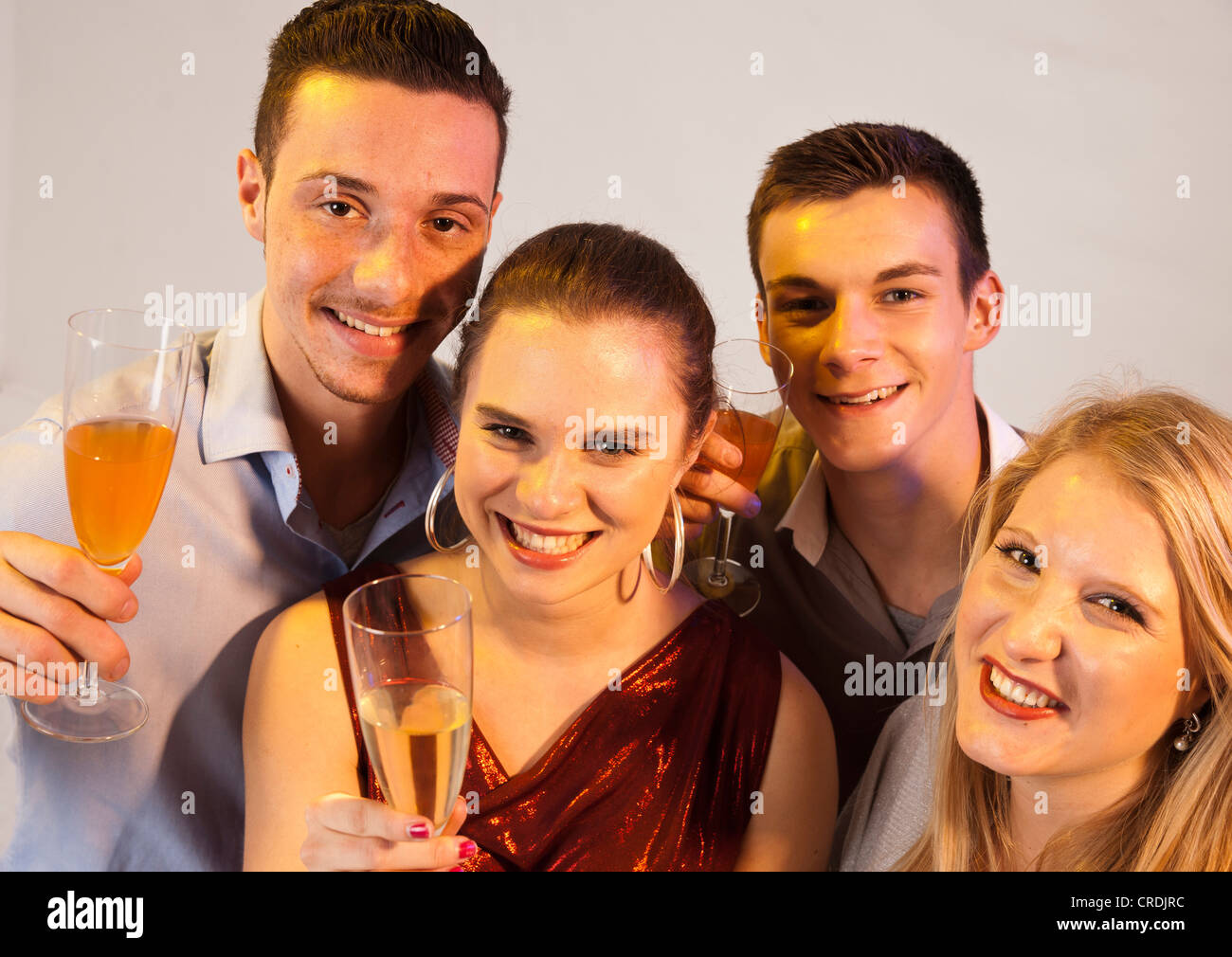 Group of young people partying Stock Photo - Alamy