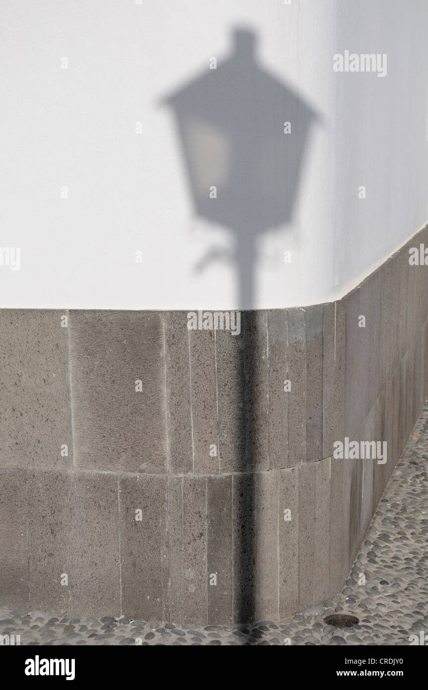shadow of street light on cladding Stock Photo - Alamy