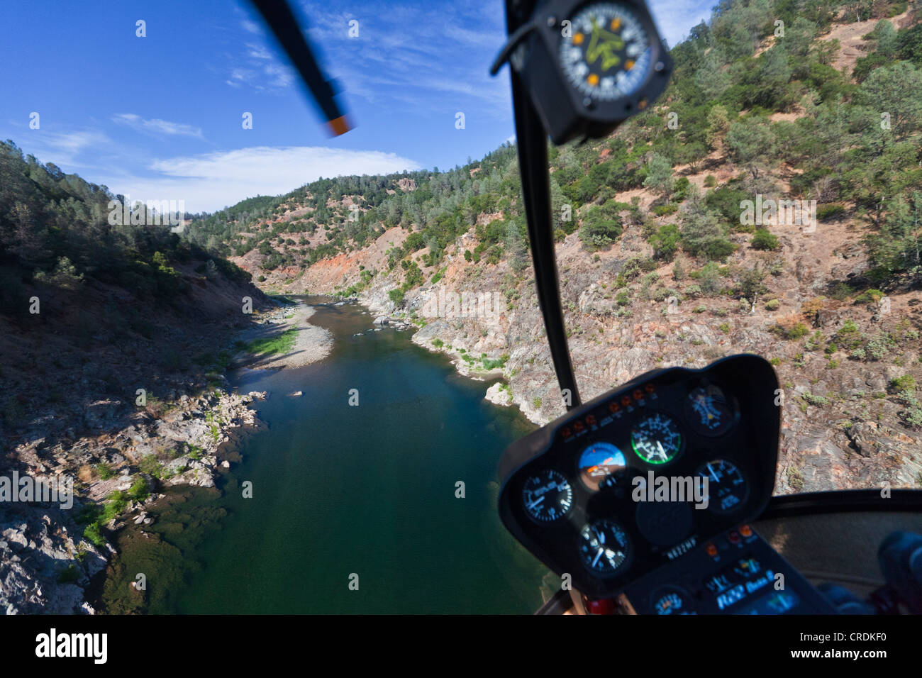 Helicopter flight over the canyon of the American River, aerial view ...